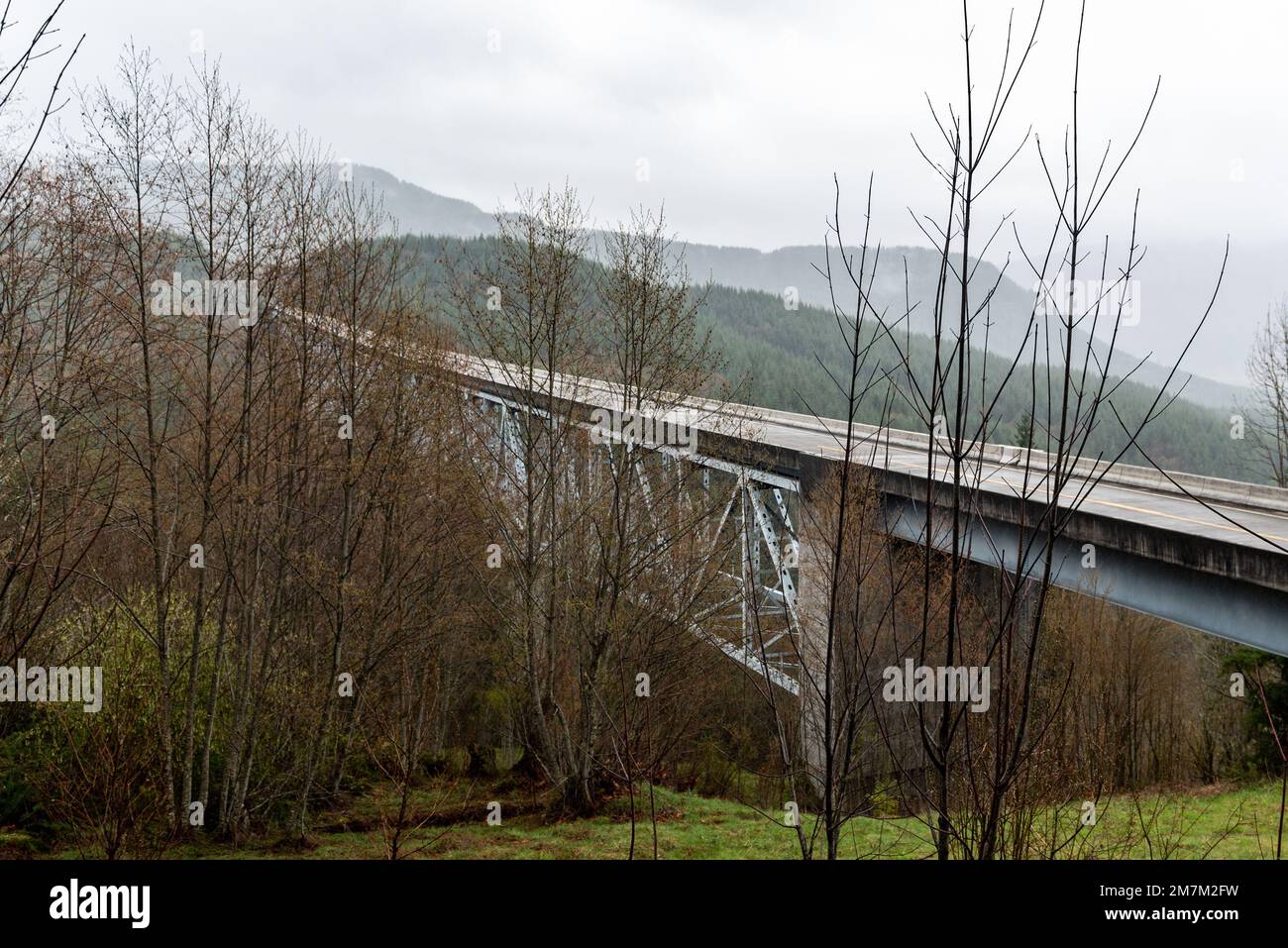 An aerial shot of a transporter bridge over a gorge in Mount St. Helens ...