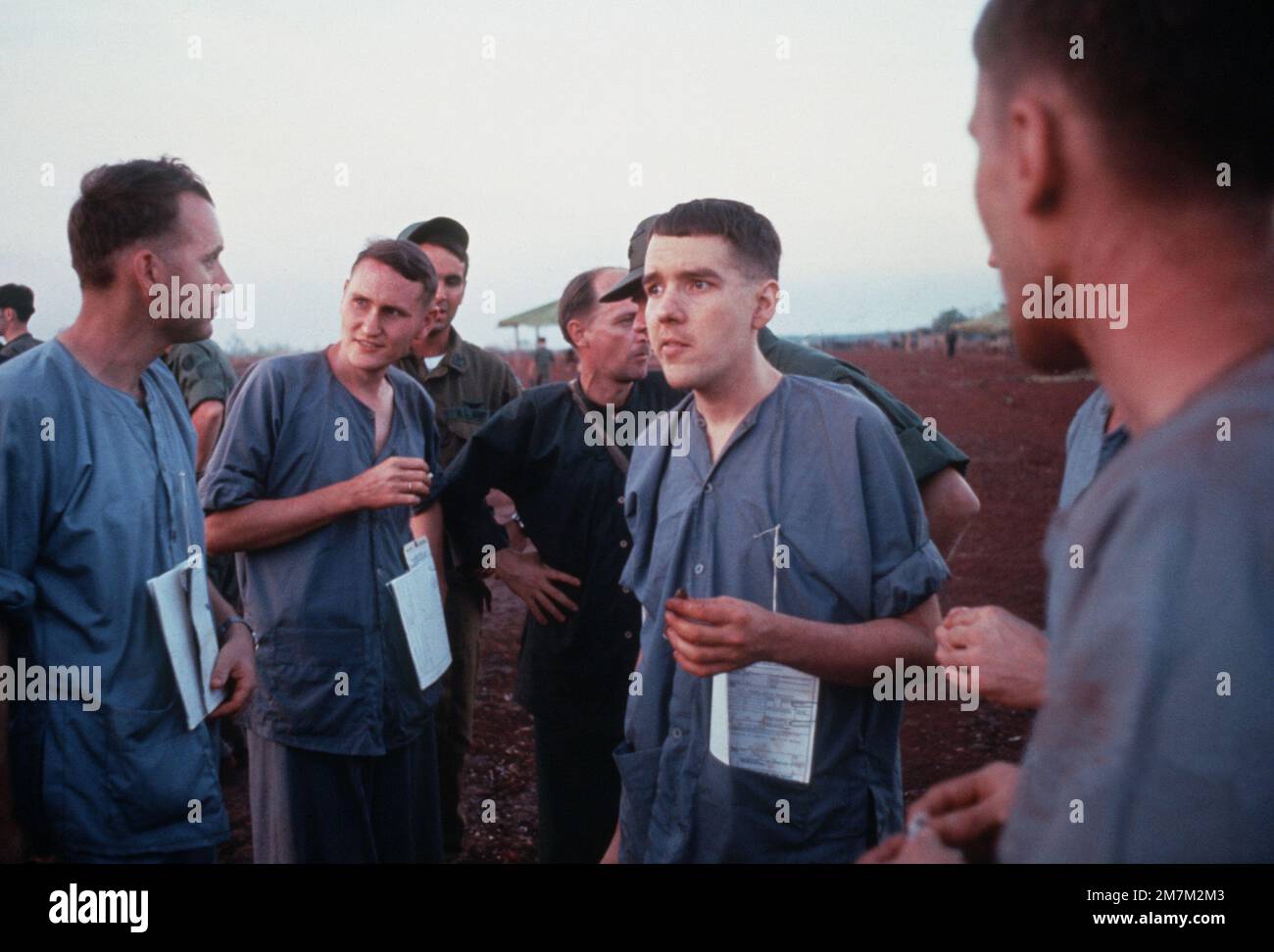Four release POWs (Left to Right) U.S. Army MAJ Albert Edwin Carlson ...
