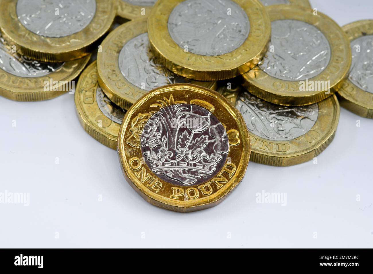 Close up view of a British One Pound coin isolated on a plain white ...