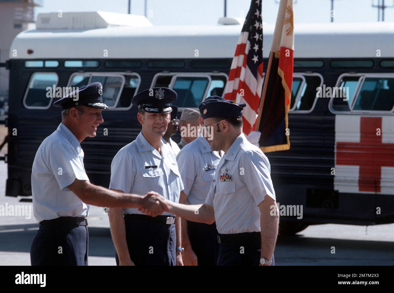 Ex-POW and U.S. Air Force MAJ Jay R. Jensen (Captured 18 Feb 67) shakes ...