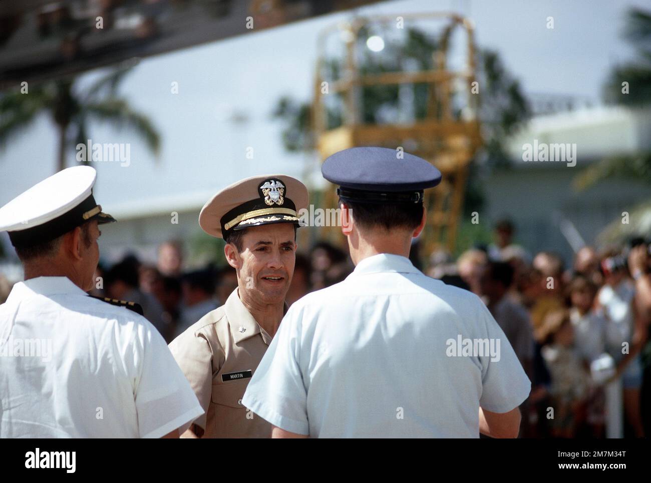 Ex-POW, U.S. Navy CMDR Edward H. Martin (Captured 19 Jul 67) shakes ...