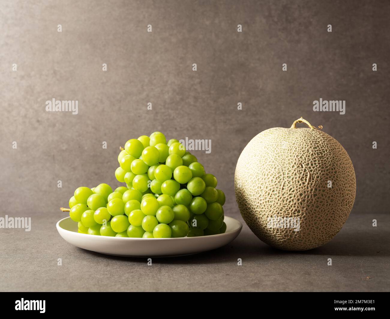 Fresh Shine Muscat and Melon Stock Photo - Alamy