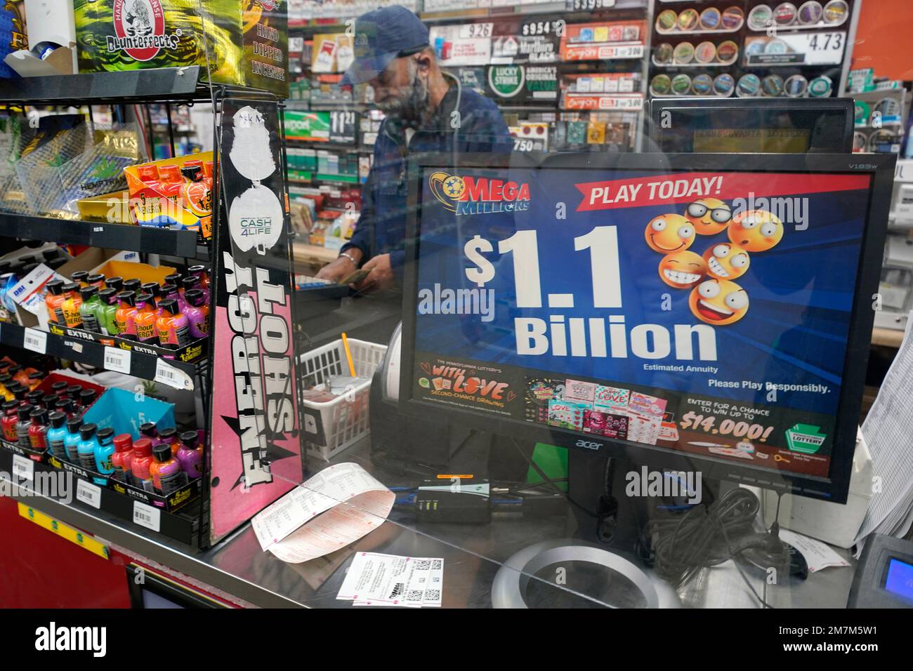 A Mega Million sign displays the estimated jackpot of $1.1 Billion at ...
