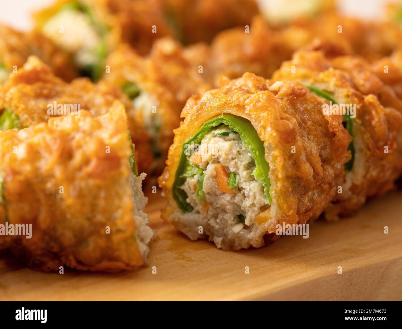 Fried chilli pepper stuffed minced meat and vegetables Stock Photo - Alamy