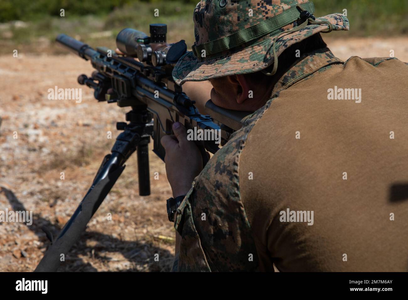 U.S. Marine Corps Sgt. Jordan Belyea, a scout sniper assigned to Echo ...