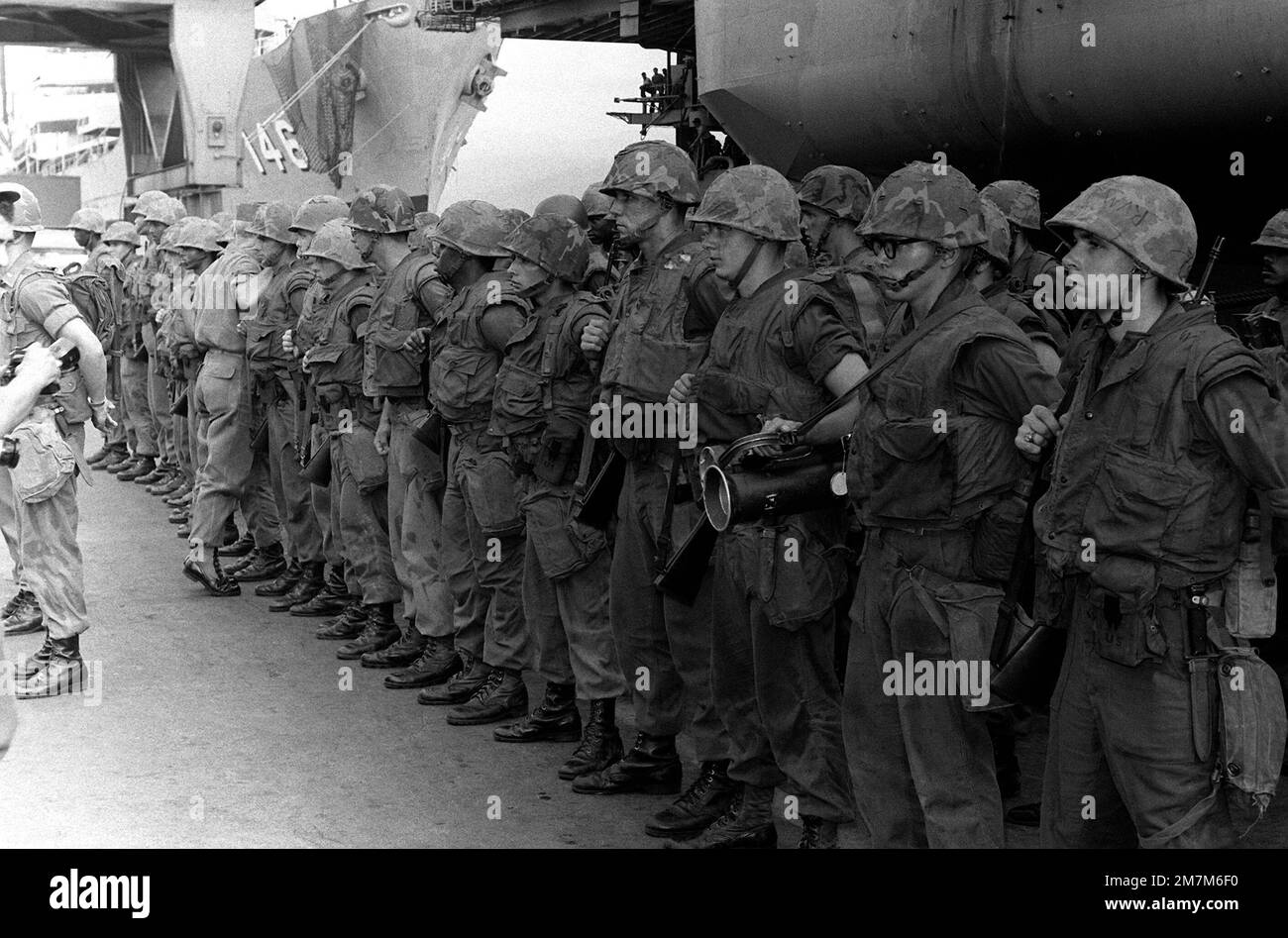 U.S. Marines from Co. G and Co. E, 2nd Bn., 9th Marines, prepare to ...