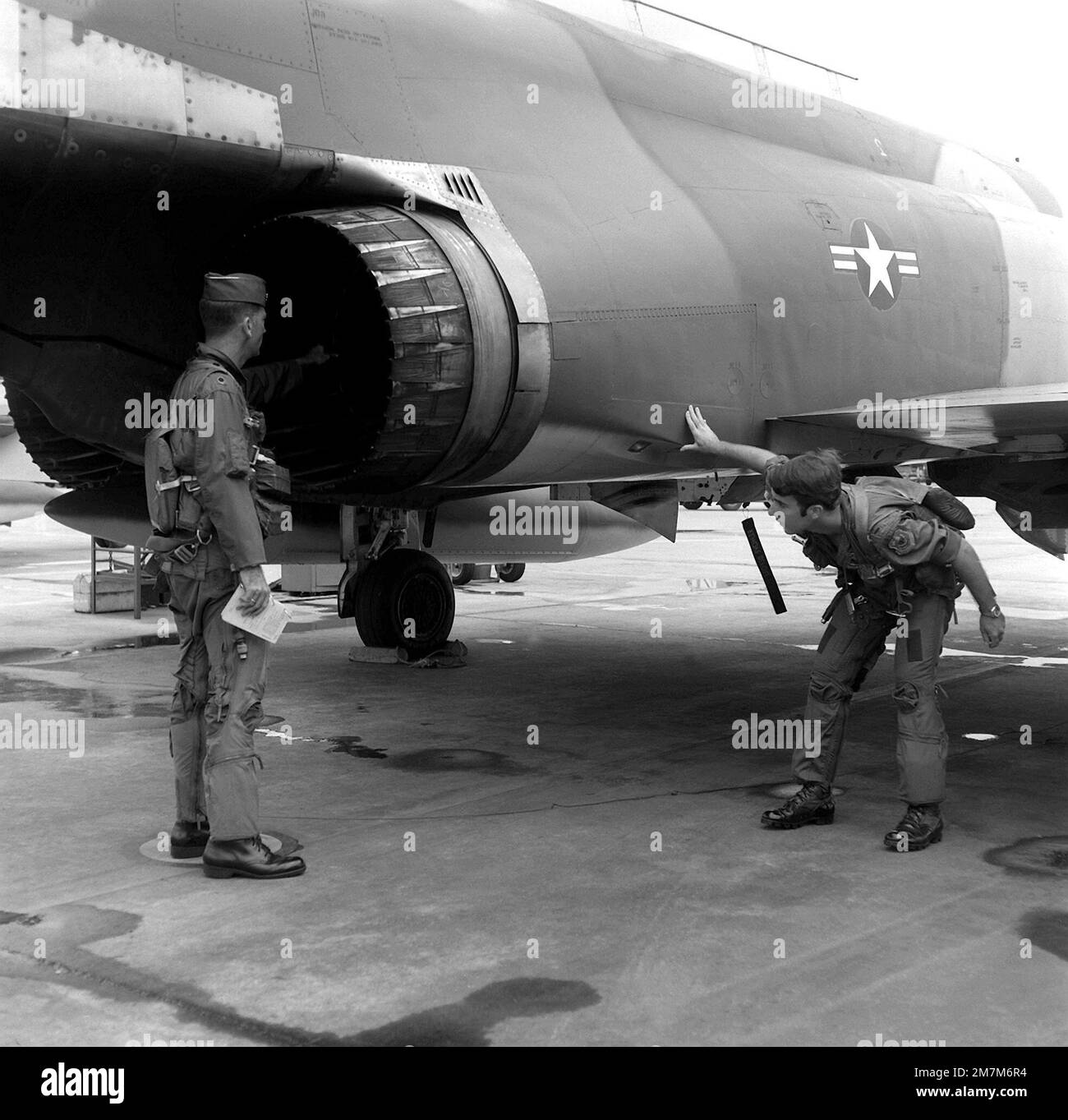 2LT Herbert Winkeller and LTC John W. Meservey, left to right, check ...