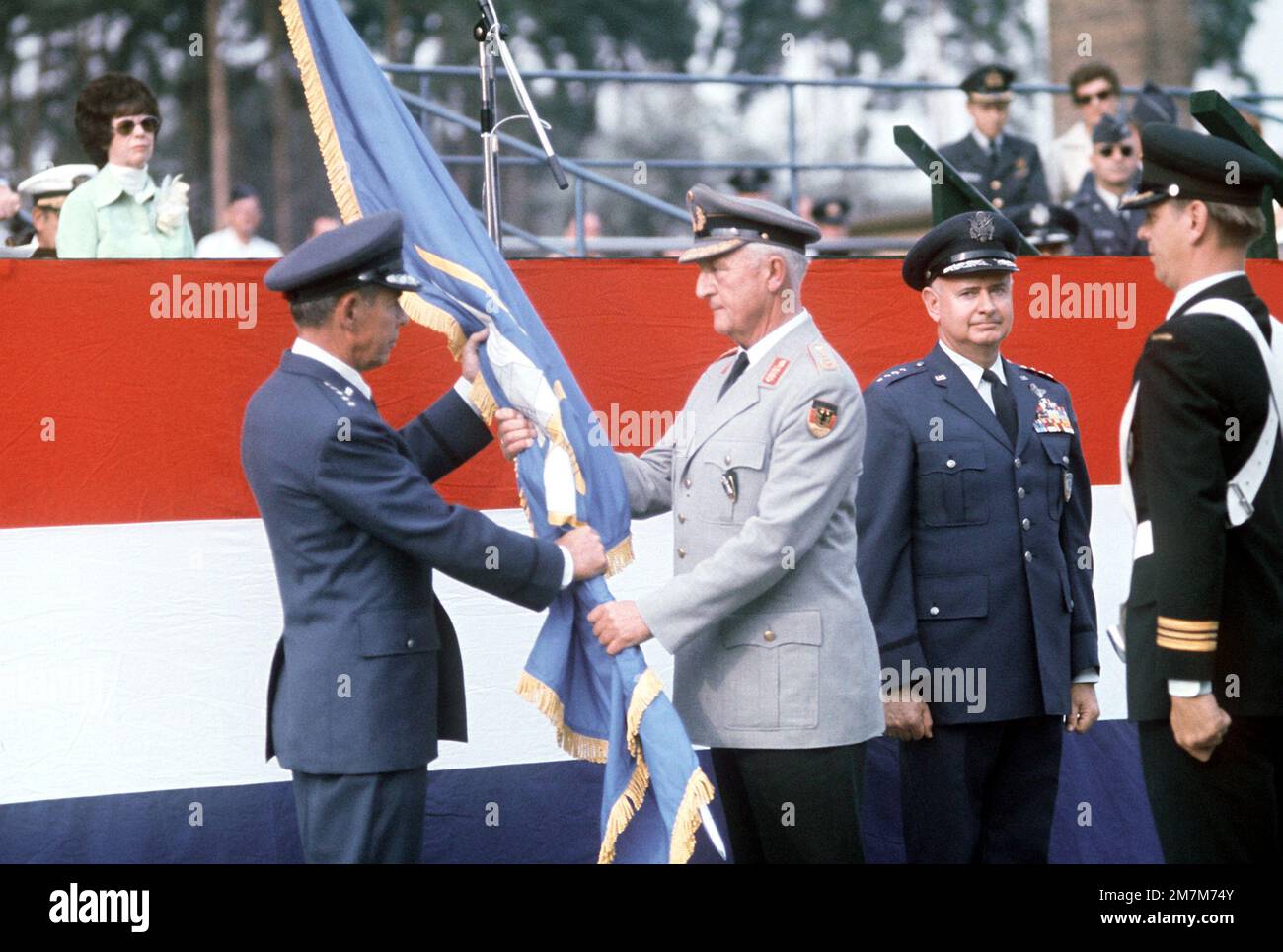 GEN Richard H. Ellis, incoming commander, receives the NATO flag from ...