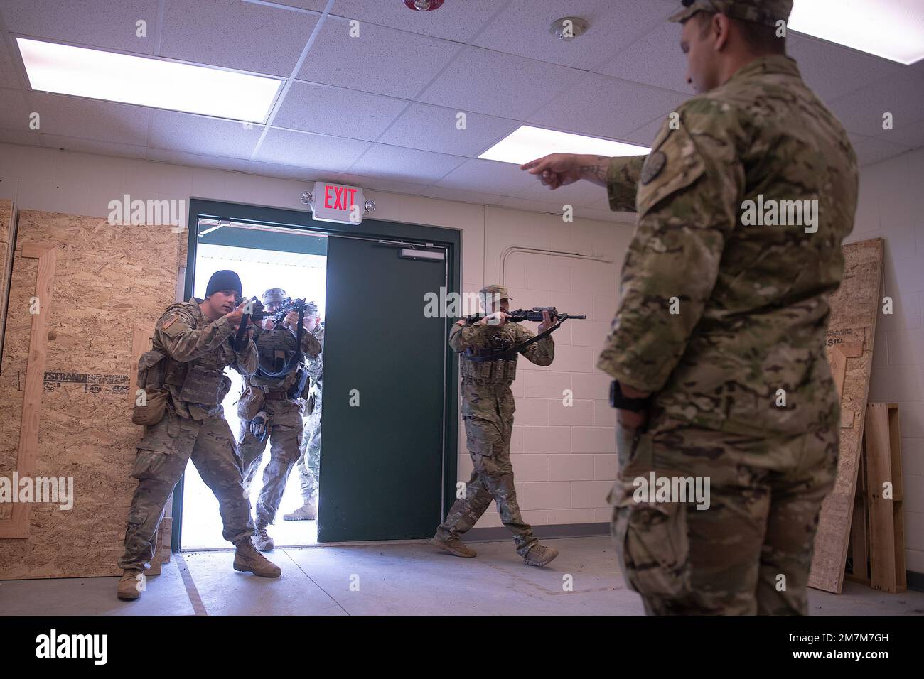Idaho Army National Guard Staff Sgt. Holden Kennedy gives instructions ...