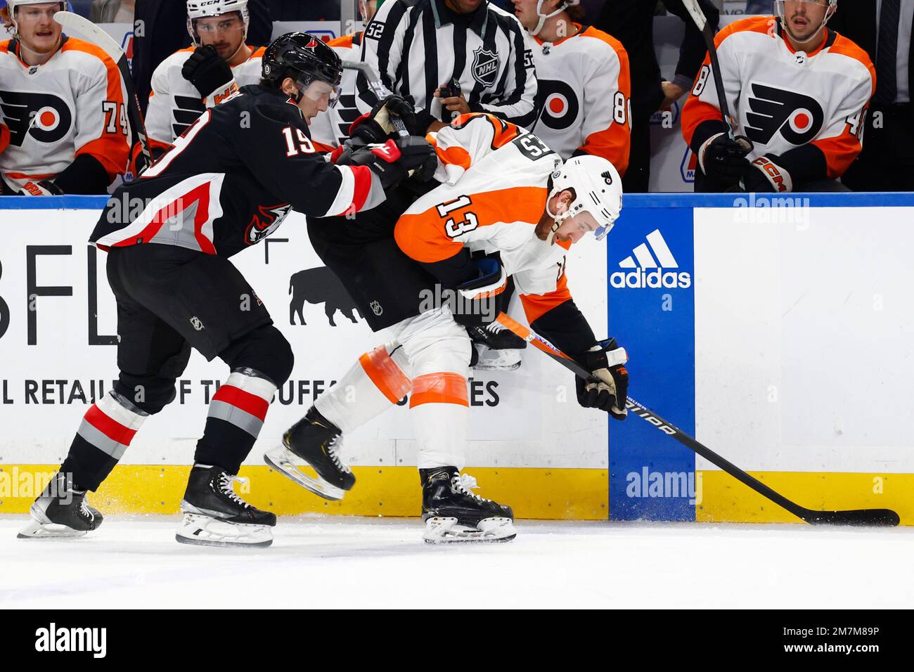Buffalo Sabres center Peyton Krebs checks Philadelphia Flyers center ...