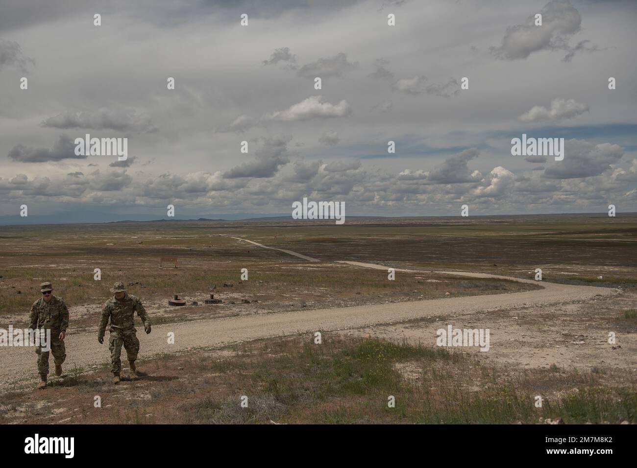 Members of the sniper team return to their shooting positions after ...