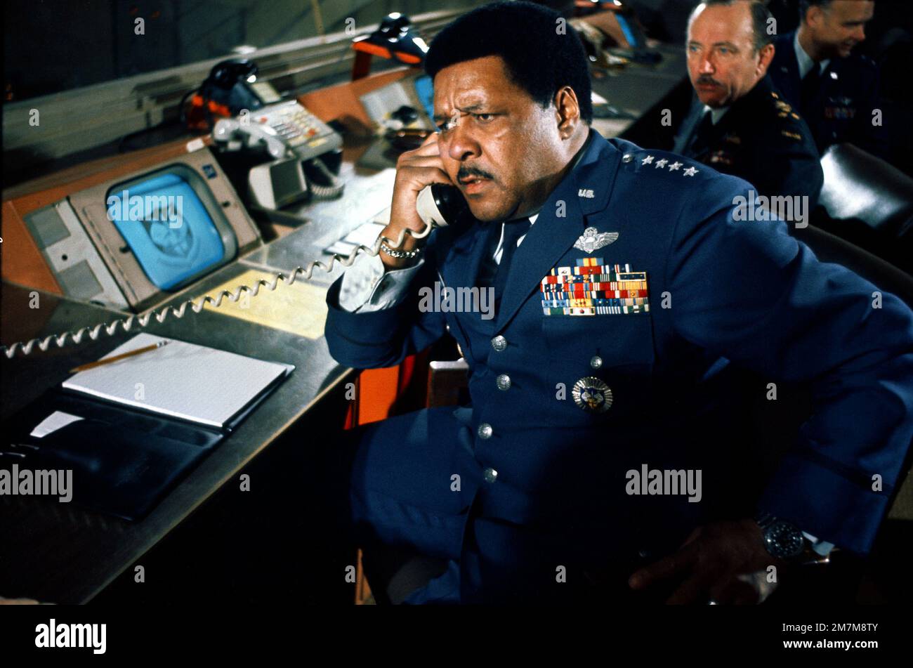 A left side view of U.S. Air Force GEN Daniel James, seated at a ...