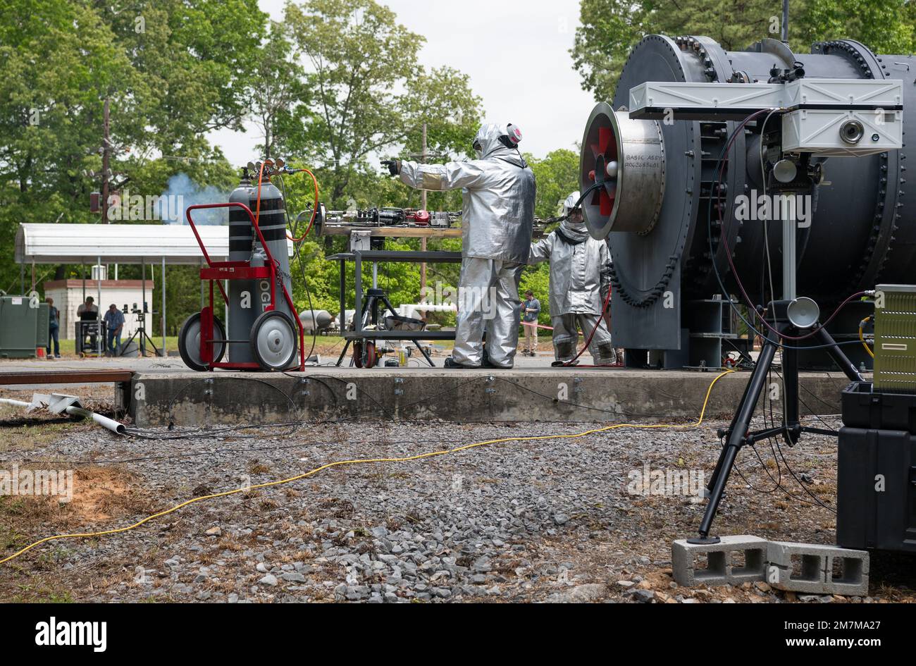 Arnold Engineering Development Complex team members swap out a depleted ...