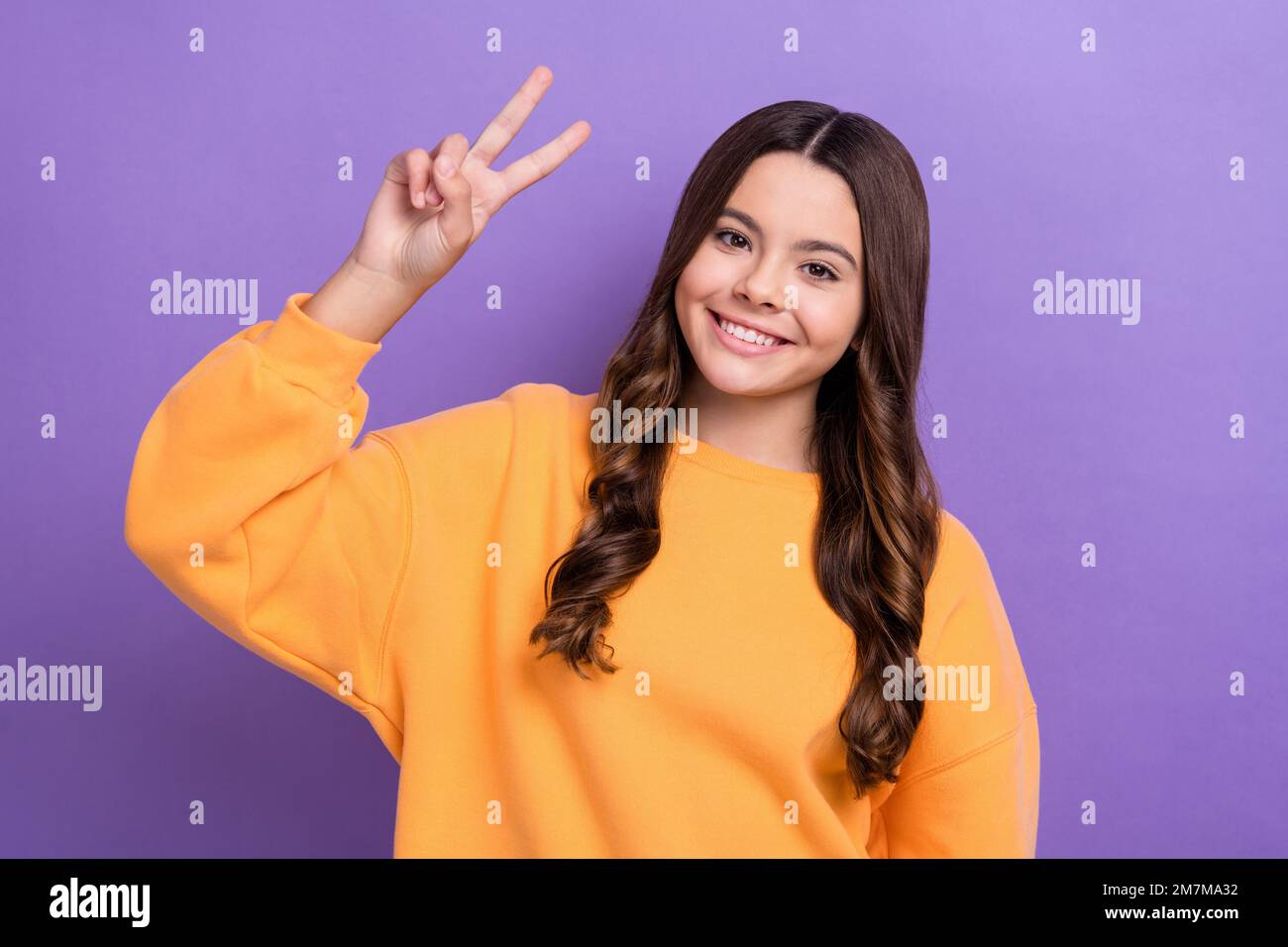 Photo of positive lovely person arm fingers demonstrate v-sign isolated ...