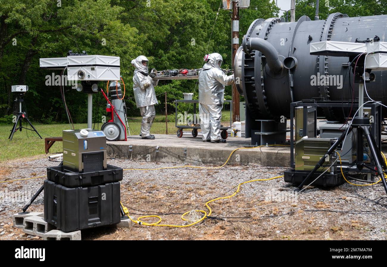 Arnold Engineering Development Complex team members swap out a depleted ...