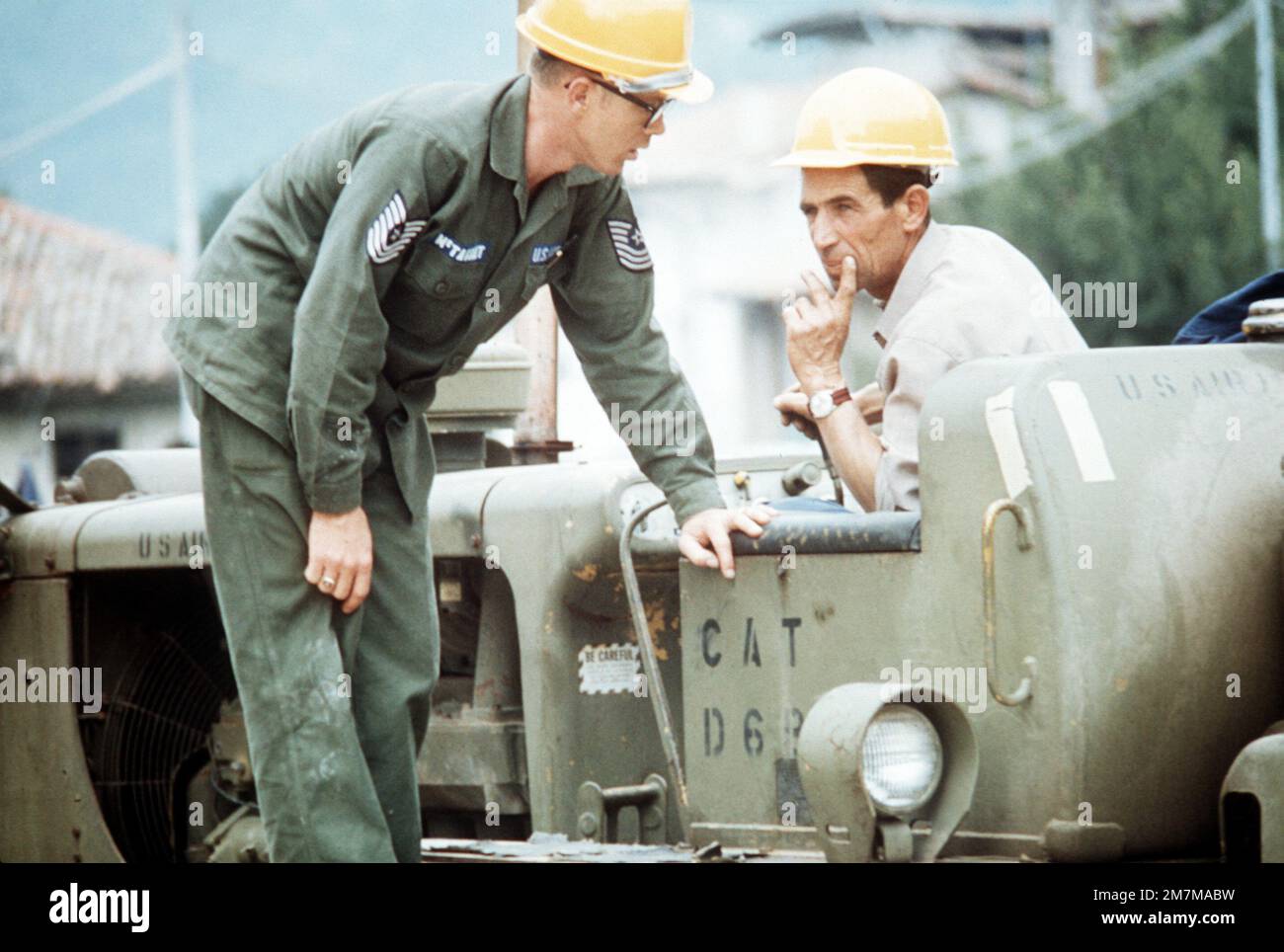 A U.S. Air Force master sergeant from Aviano Air Base, Italy, confers ...