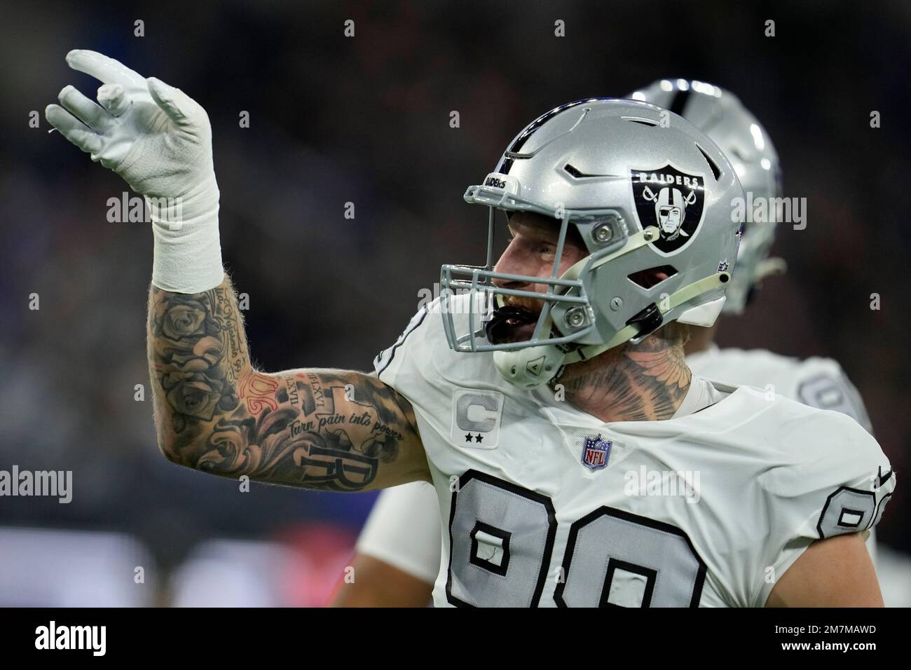 Las Vegas Raiders defensive end Maxx Crosby reacts after stopping Los ...