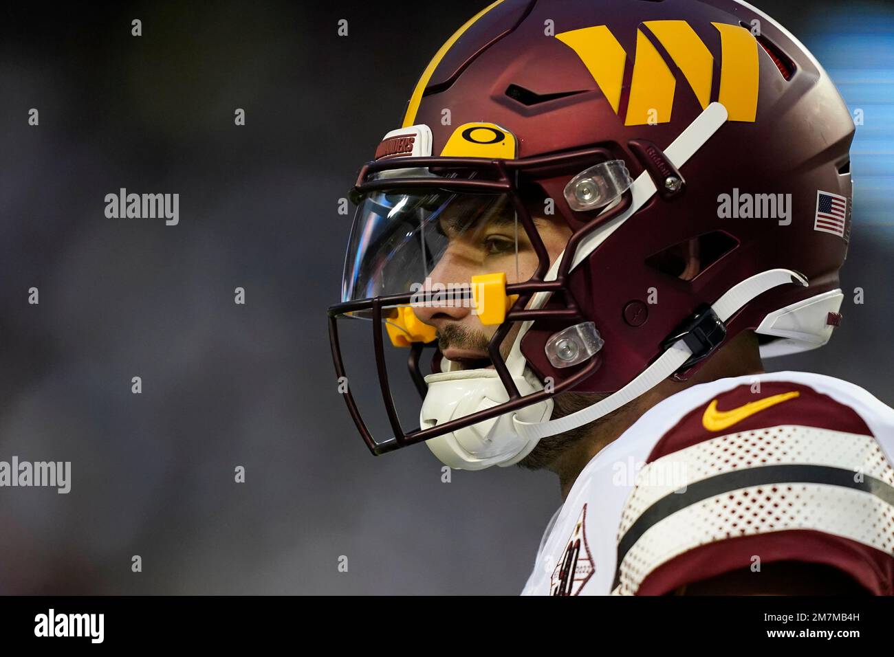 Washington Commanders quarterback Sam Howell walks on the field in the ...