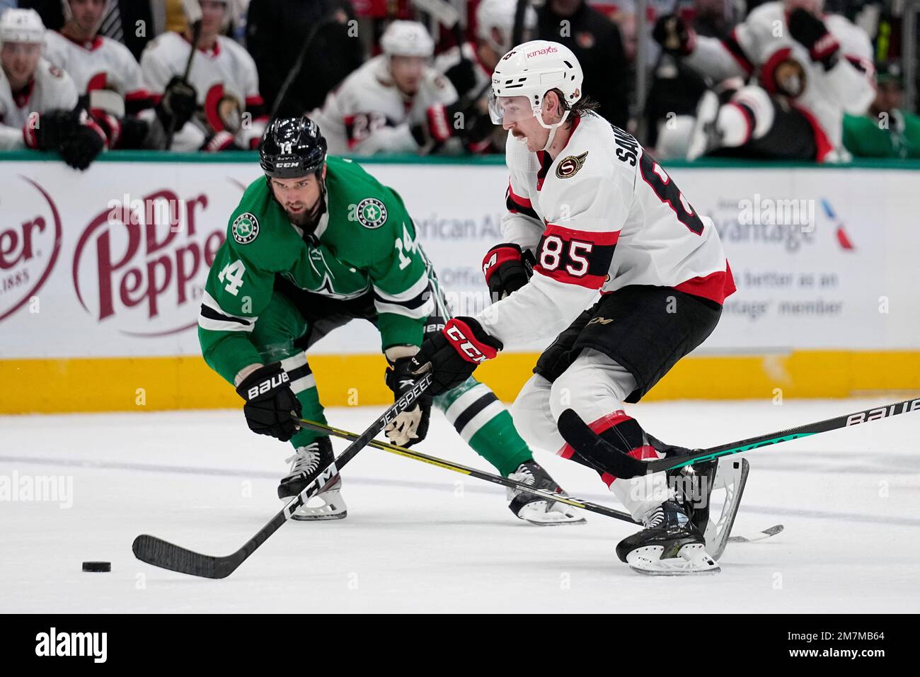 Ottawa Senators defenseman Jake Sanderson (85) moves the puck past ...