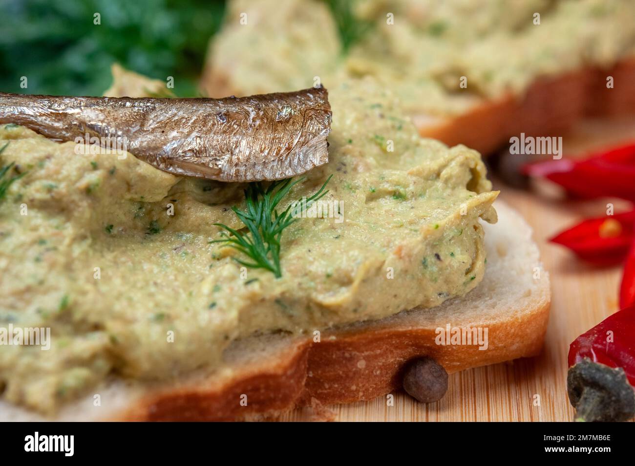 Sandwich with pate and sprats. Sprat pate with spinach and pepper ...
