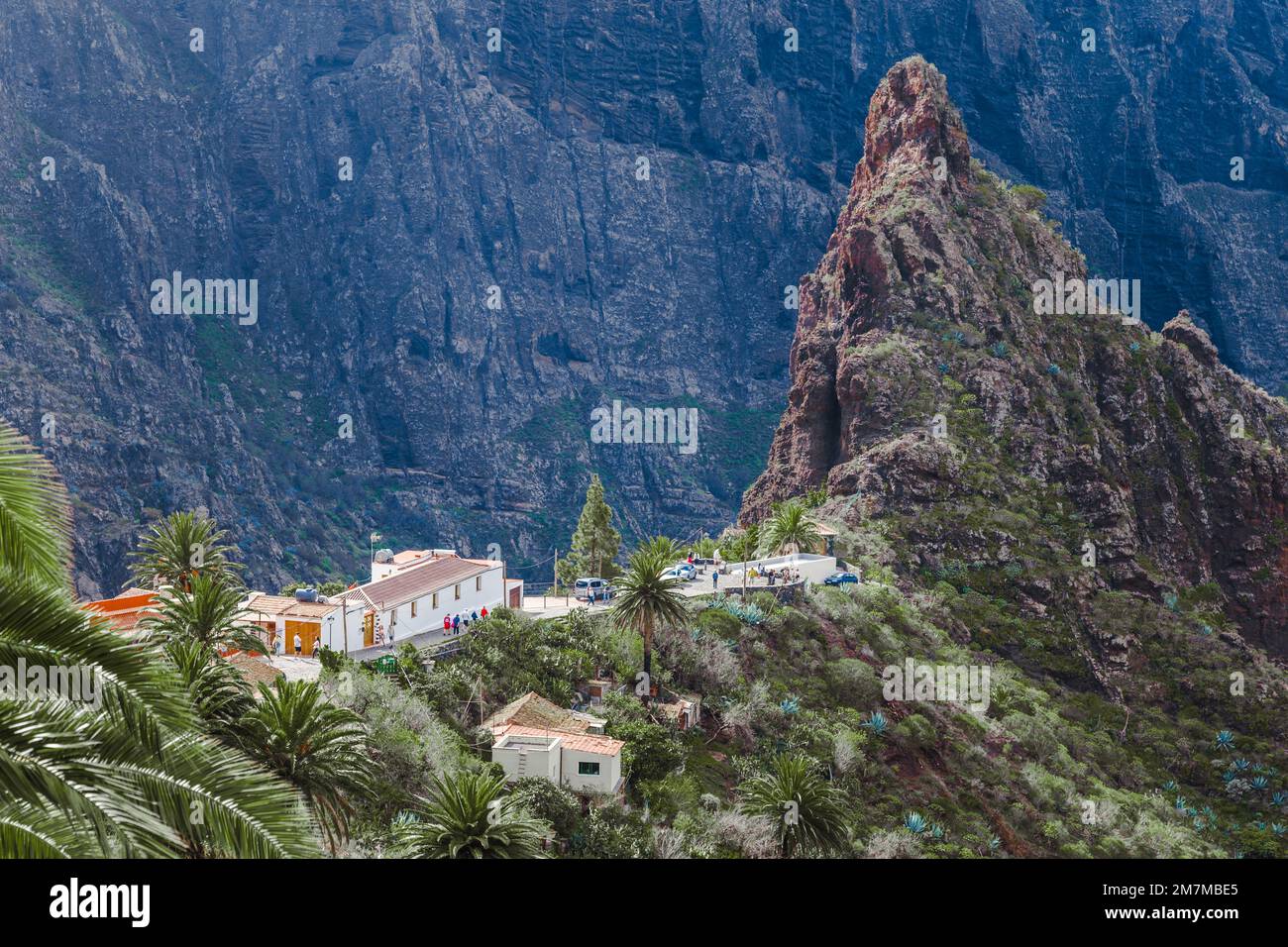 A narrow telephoto view of a rising stand-out rock in Masca Valley ...