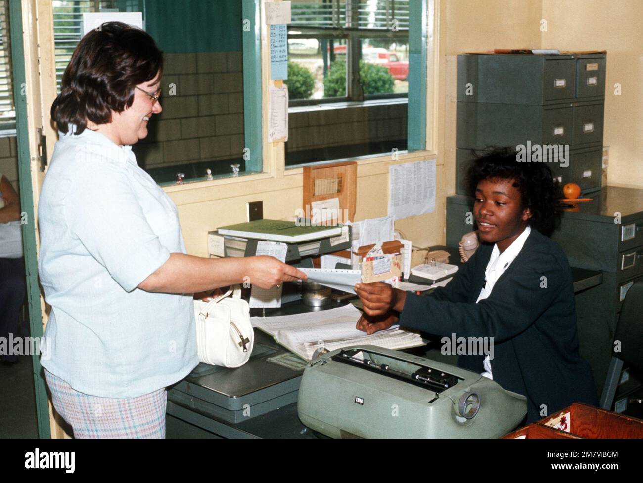 SPEC. 5 Adrina Williams, an X-ray technician, receives Mildred Shipley ...