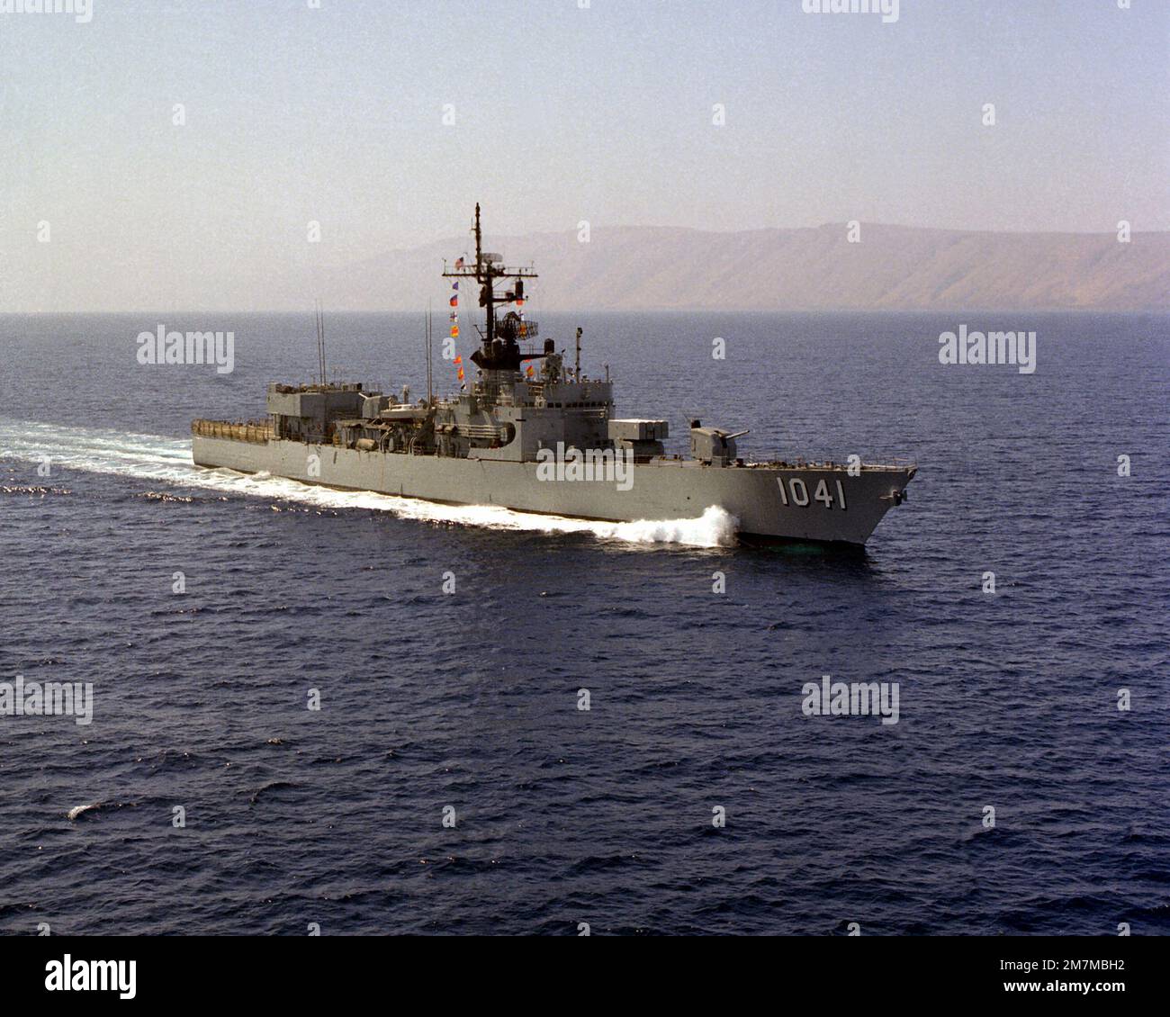 An aerial starboard bow view of the frigate USS BRADLEY (FF-1041 ...