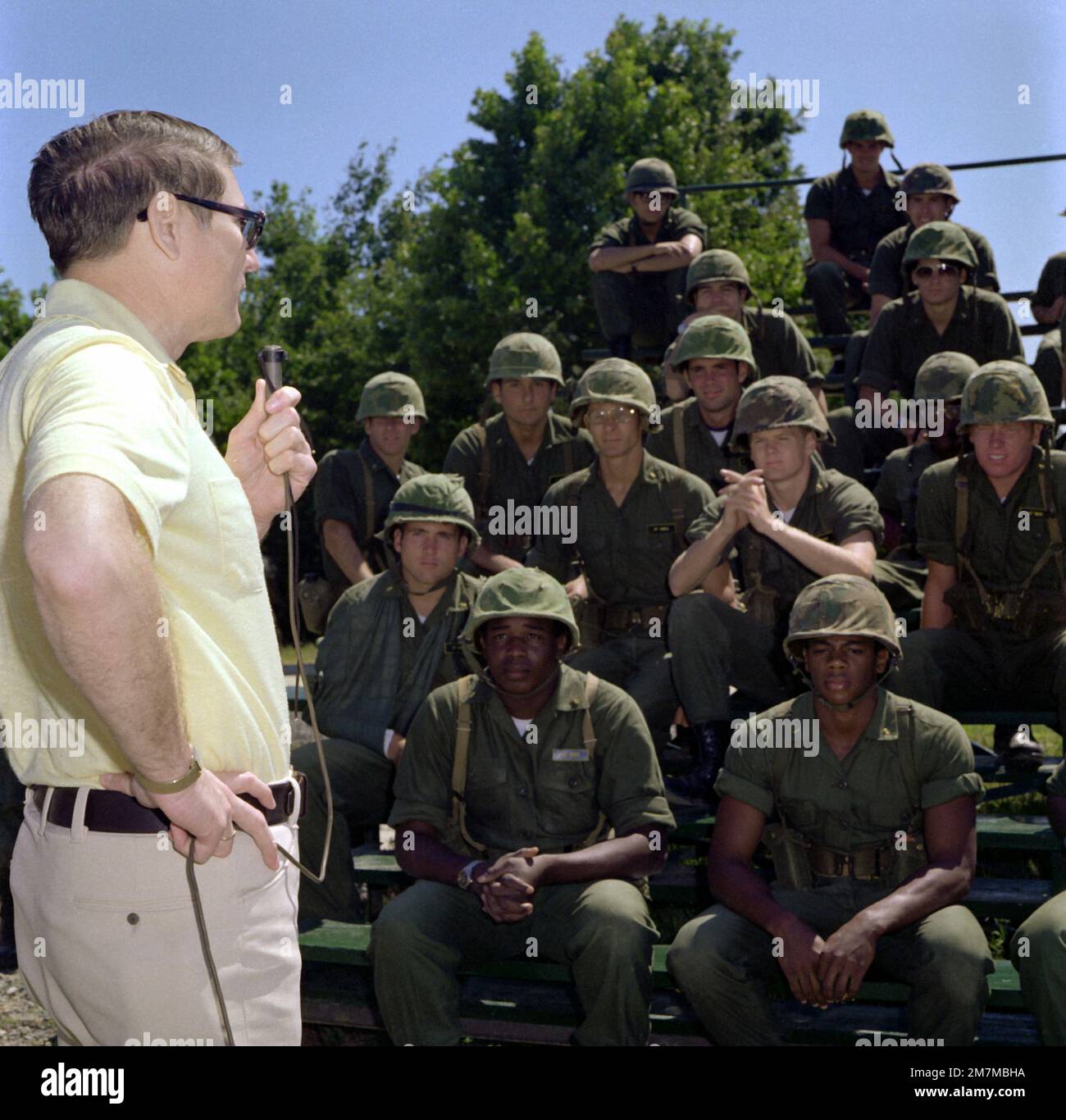 Assistant Secretary of the Navy G.D. Penisten speaks to Navy midshipmen ...