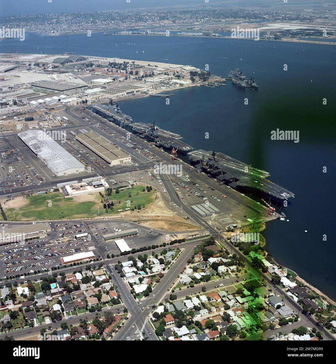 An aerial view of ships moored at Naval Air Station, North Island. They ...