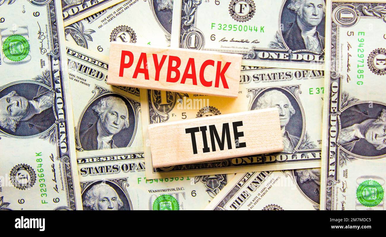 Payback time symbol. Concept words Payback time on wooden blocks ...