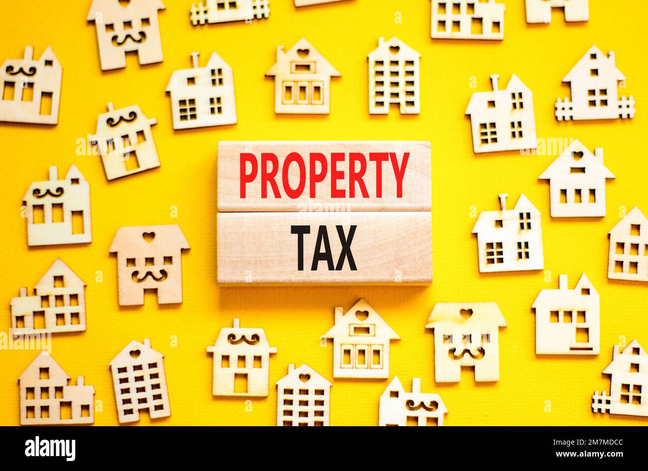 Property tax symbol. Concept words Property tax on wooden blocks ...