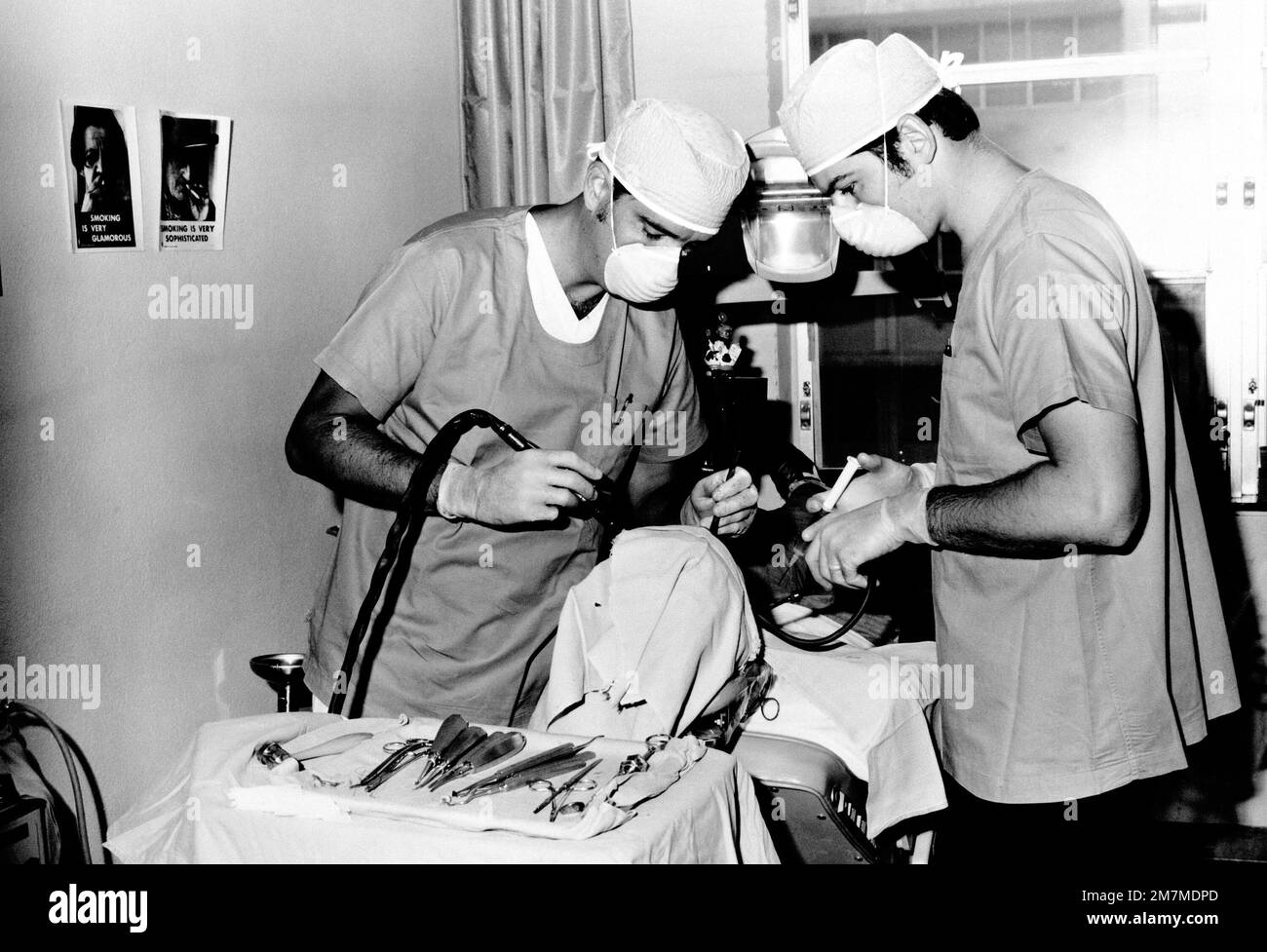 Doctors perform oral surgery at the Dental Clinic at the U.S. Army ...