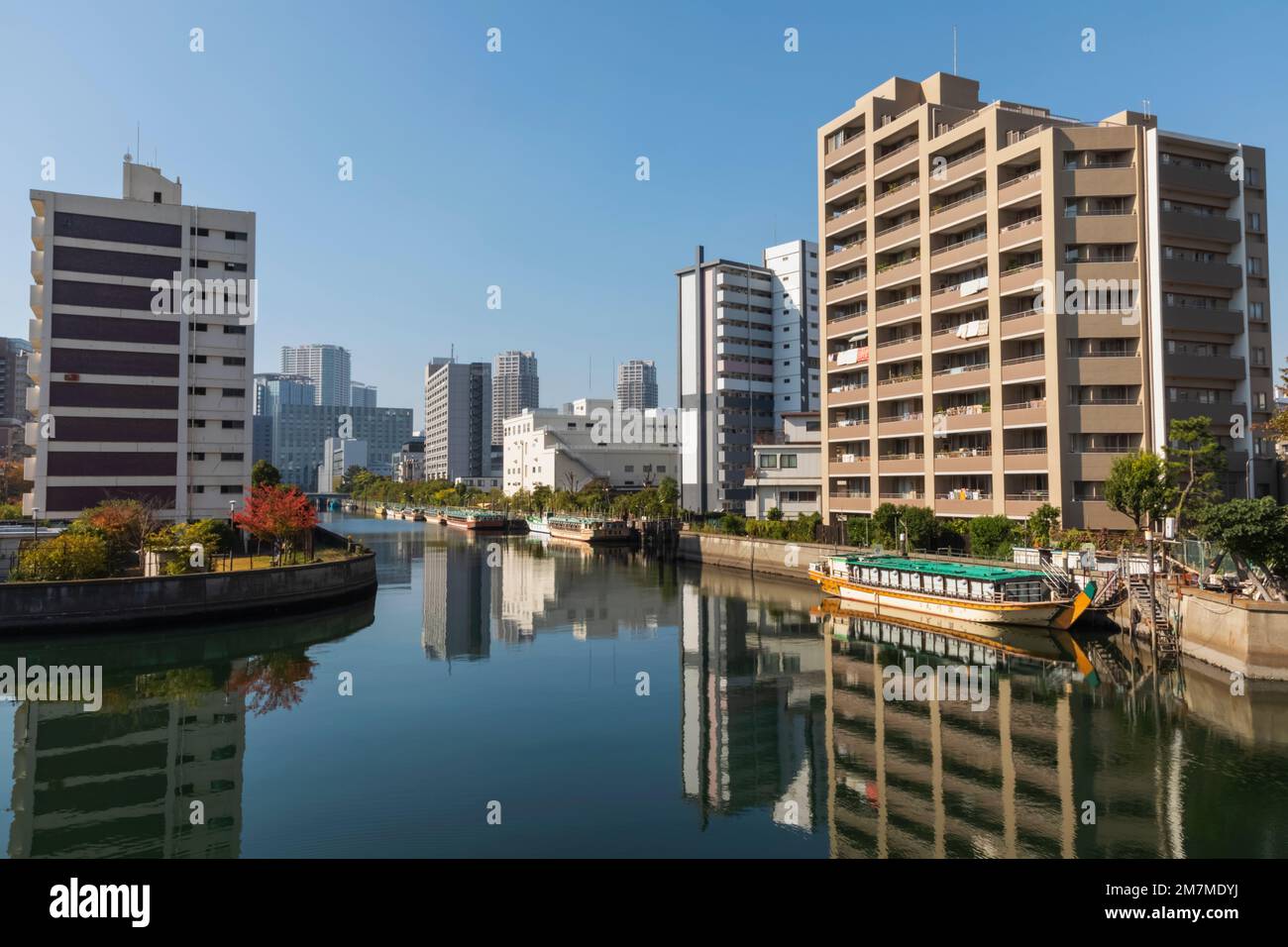 Japan, Honshu, Tokyo, Toyosu, Canal and Toyosu Area Skyline Stock Photo ...