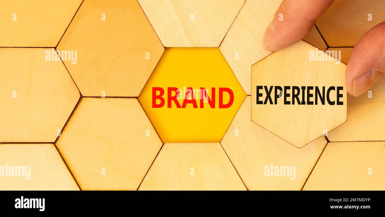 Brand experience symbol. Concept words Brand experience on wooden ...