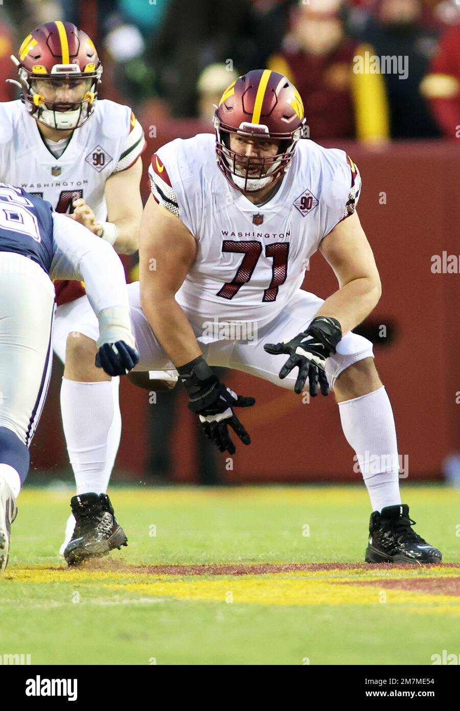Washington Commanders guard Wes Schweitzer (71) blocks during an NFL ...