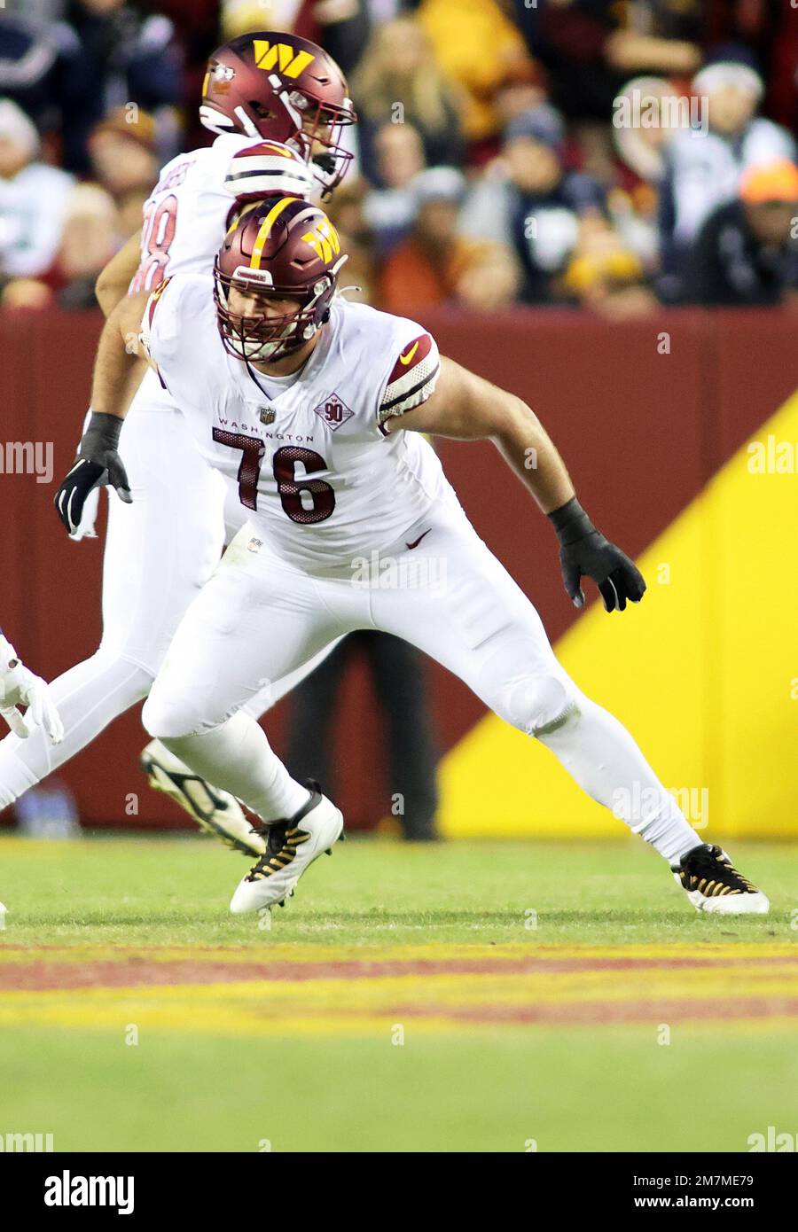 Washington Commanders offensive tackle Sam Cosmi (76) blocks during an ...