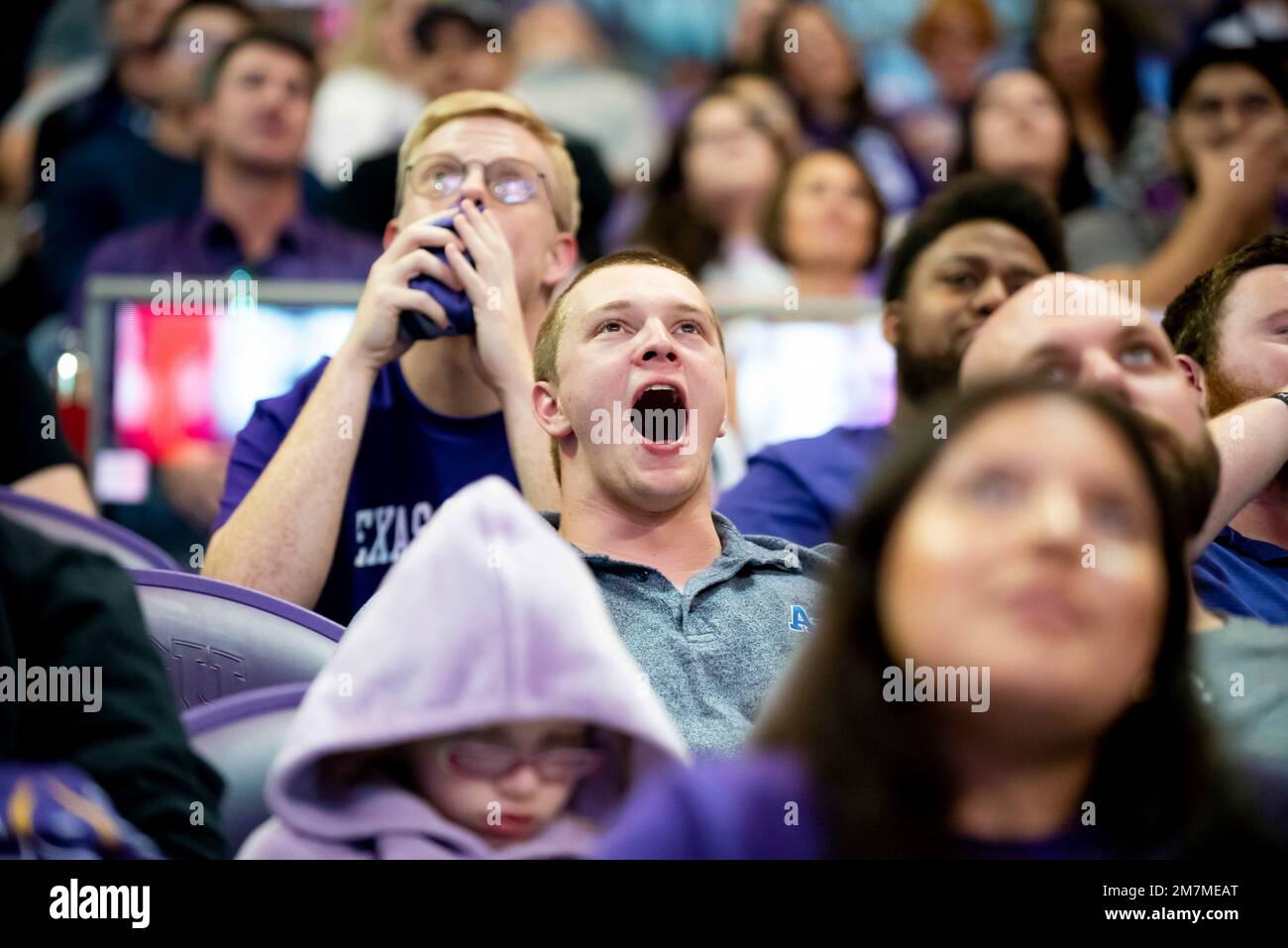 A fan reacts to a big play during a watch party for the NCAA College ...