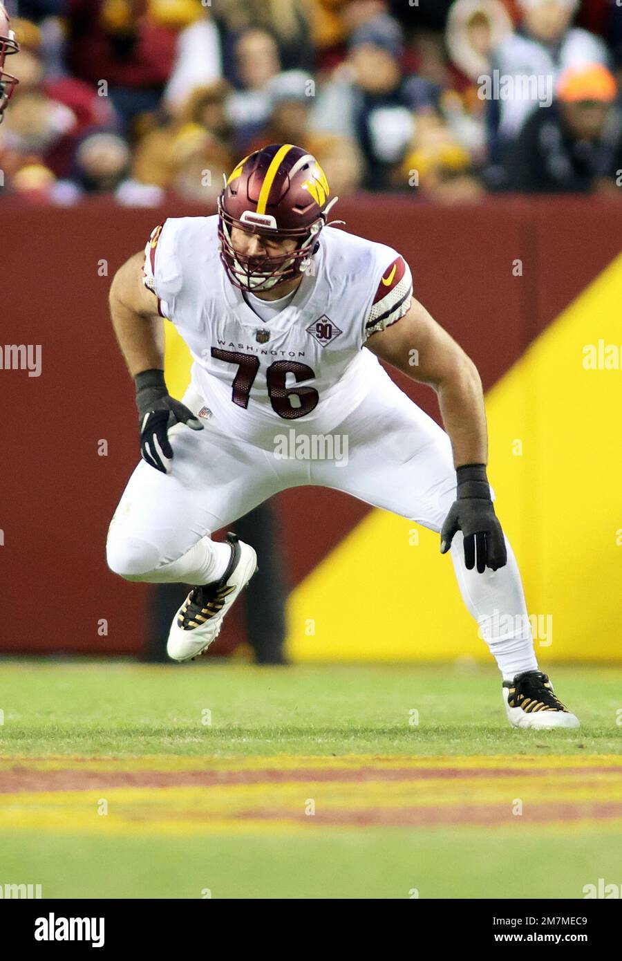 Washington Commanders offensive tackle Sam Cosmi (76) blocks during an ...