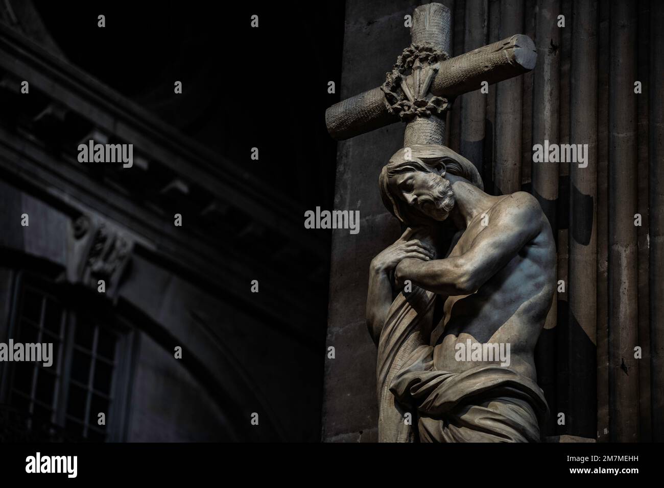 Paris, France - Dec. 27 2022: Jesus Statue with cross in St-Sulpice ...