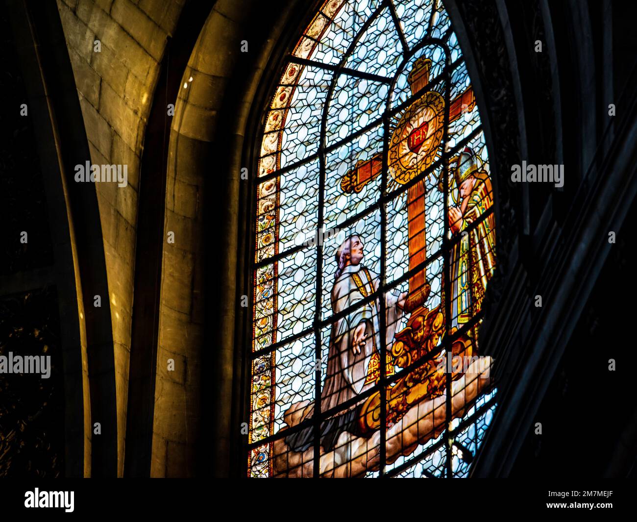 Paris, France - Dec. 27 2022: Stained glass window shaded in sunlight ...