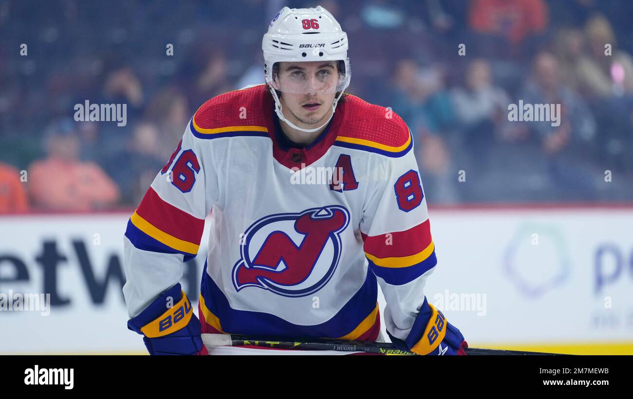 New Jersey Devils' Jack Hughes plays during an NHL hockey game ...