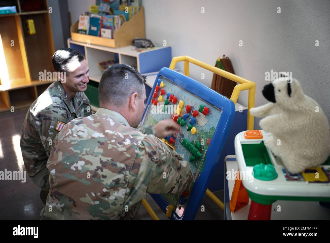 U.S. Army Staff Sgt. Brandon T. Meyer (left) who is a Kennel Master ...