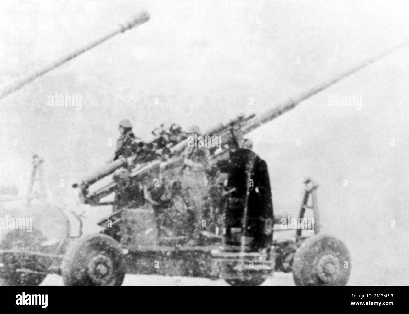 A right side view of a manned Soviet KS-19 100mm anti-aircraft gun ...