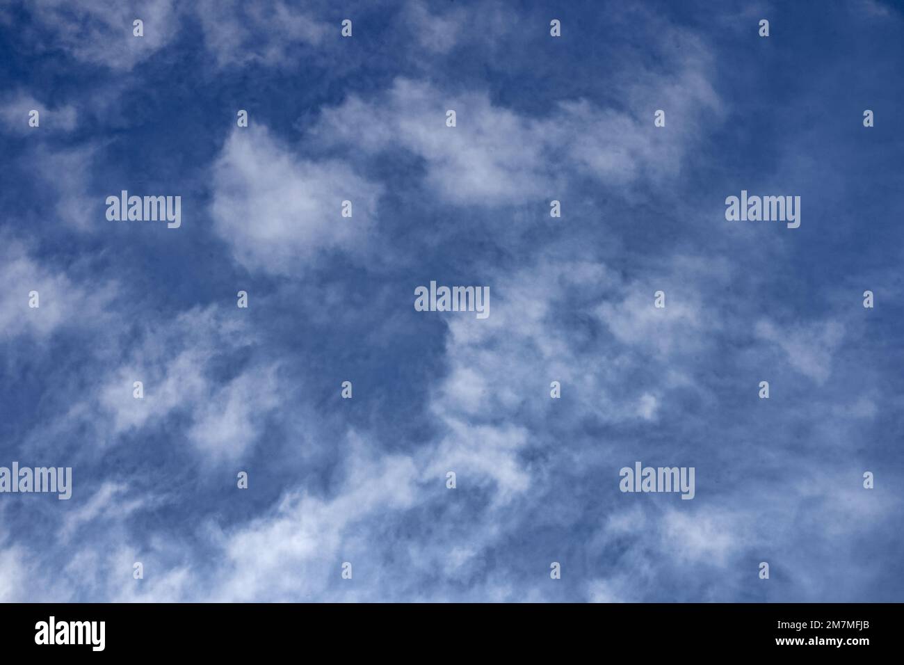 Winter blue sky with fluffy white clouds. Cold blue sky. Clouds in the blue sky Stock Photo - Alamy