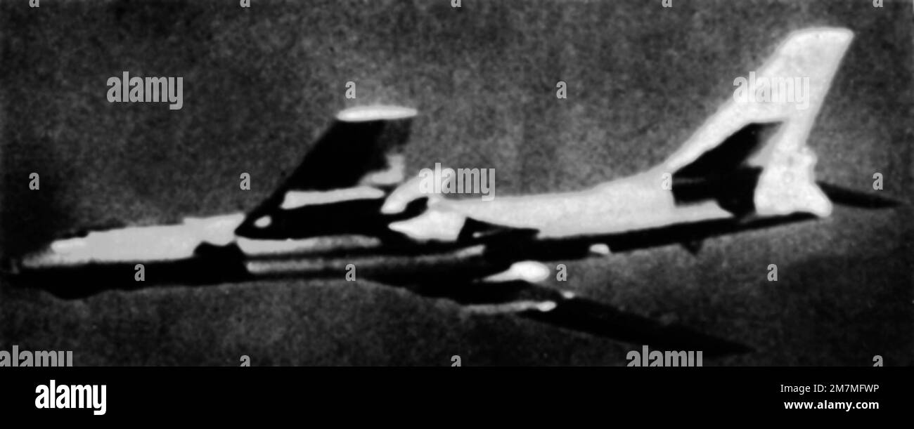 A left side view of a Soviet Tu-16 Badger bomber aircraft in flight ...