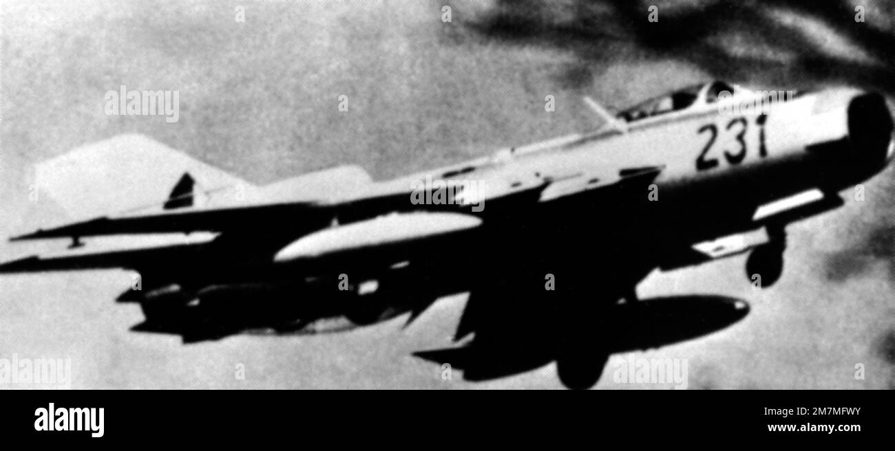 A right front underside view of a Soviet MiG-19 Farmer fighter aircraft ...