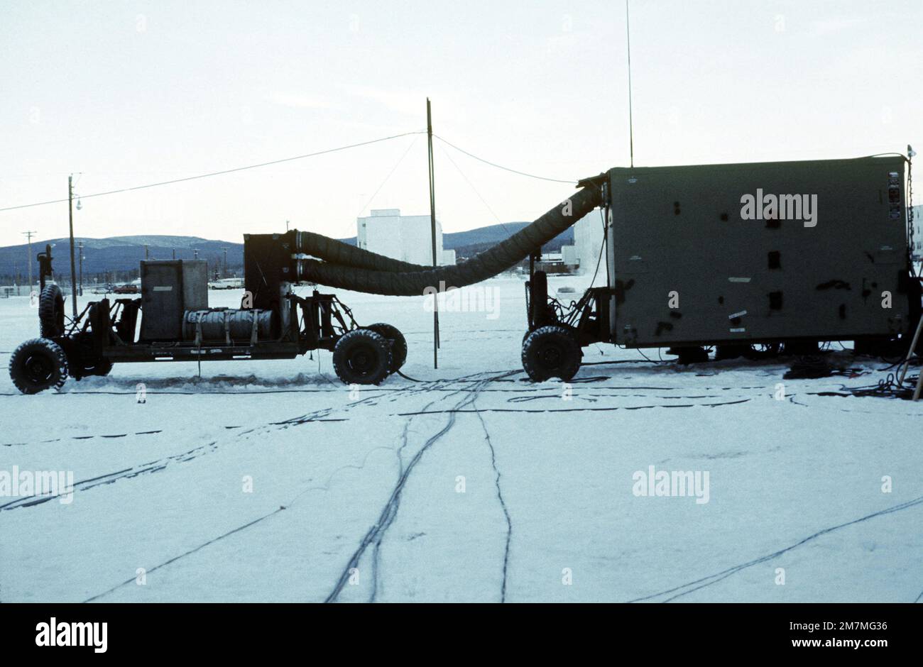 An exterior view of TSC-62 technical control central van and utility ...