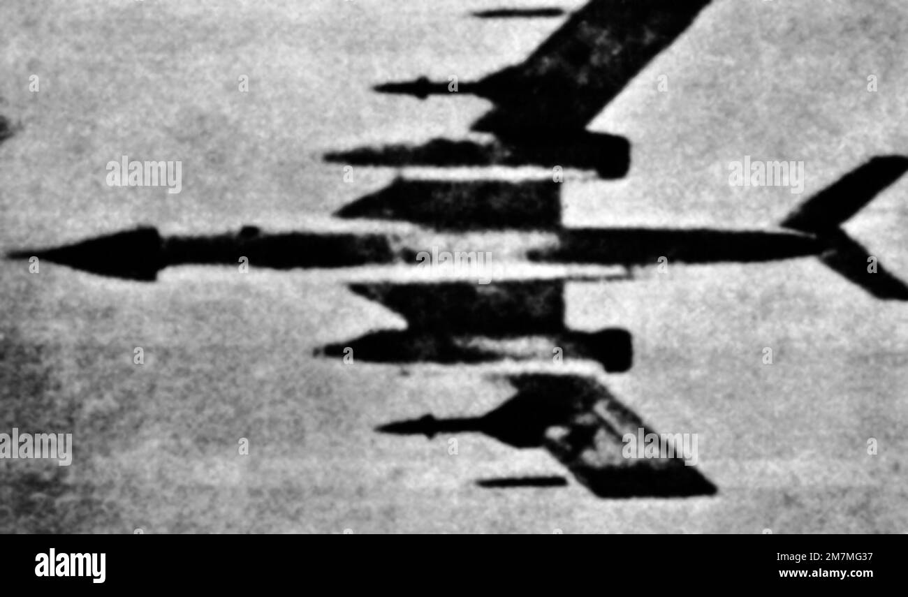 An underside view of a Soviet Yak-28 Firebar fighter aircraft in flight ...