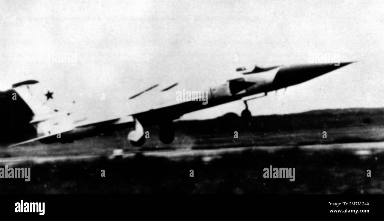 A left side view of a Soviet Su-15 Flagon-B fighter aircraft landing on ...