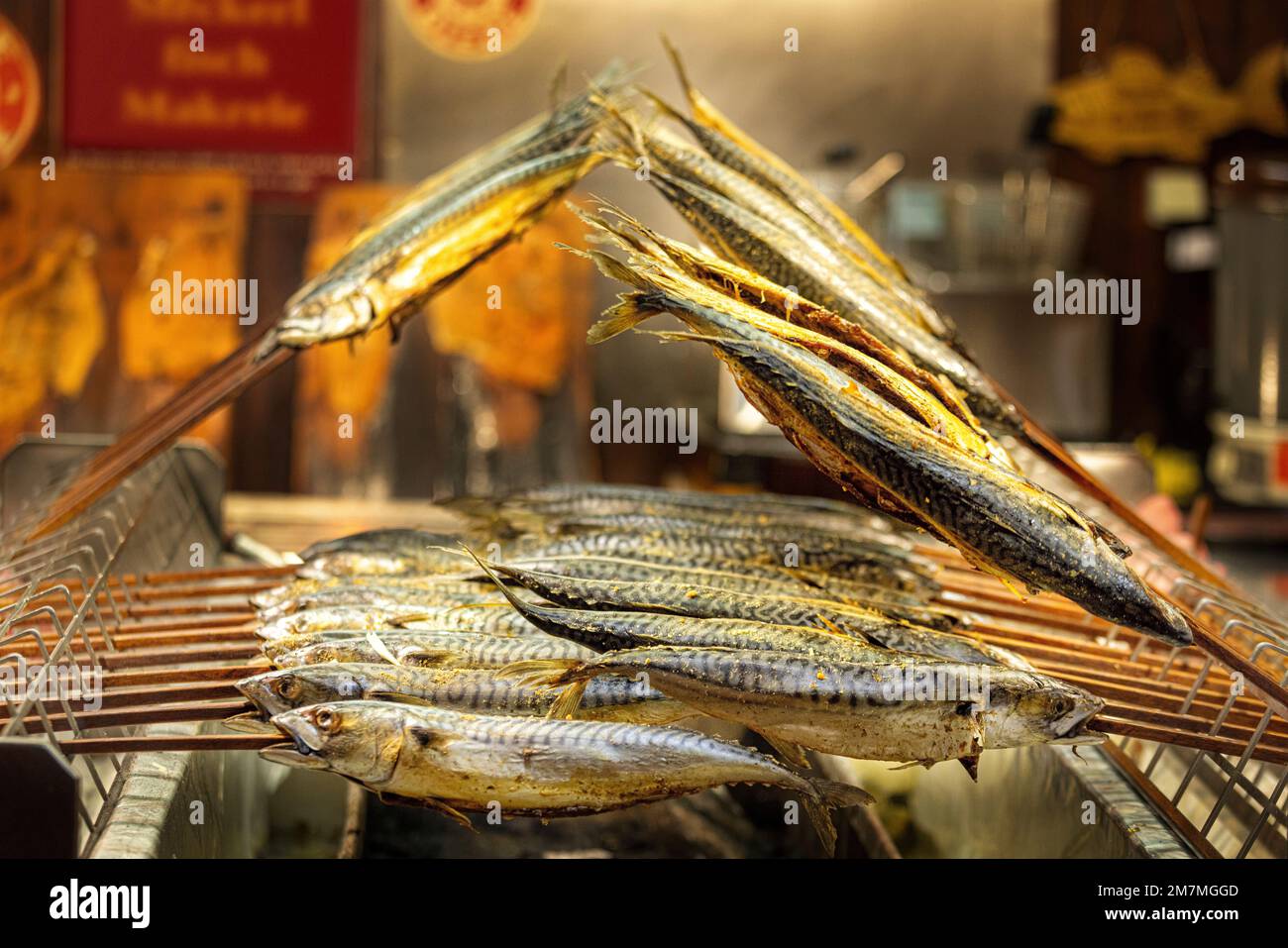 Plug fish on the grill Stock Photo - Alamy